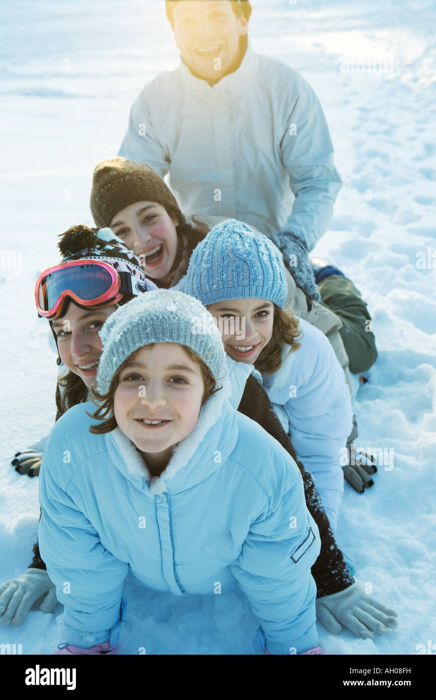 Group having fun in snow, portrait Stock Photo - Alamy