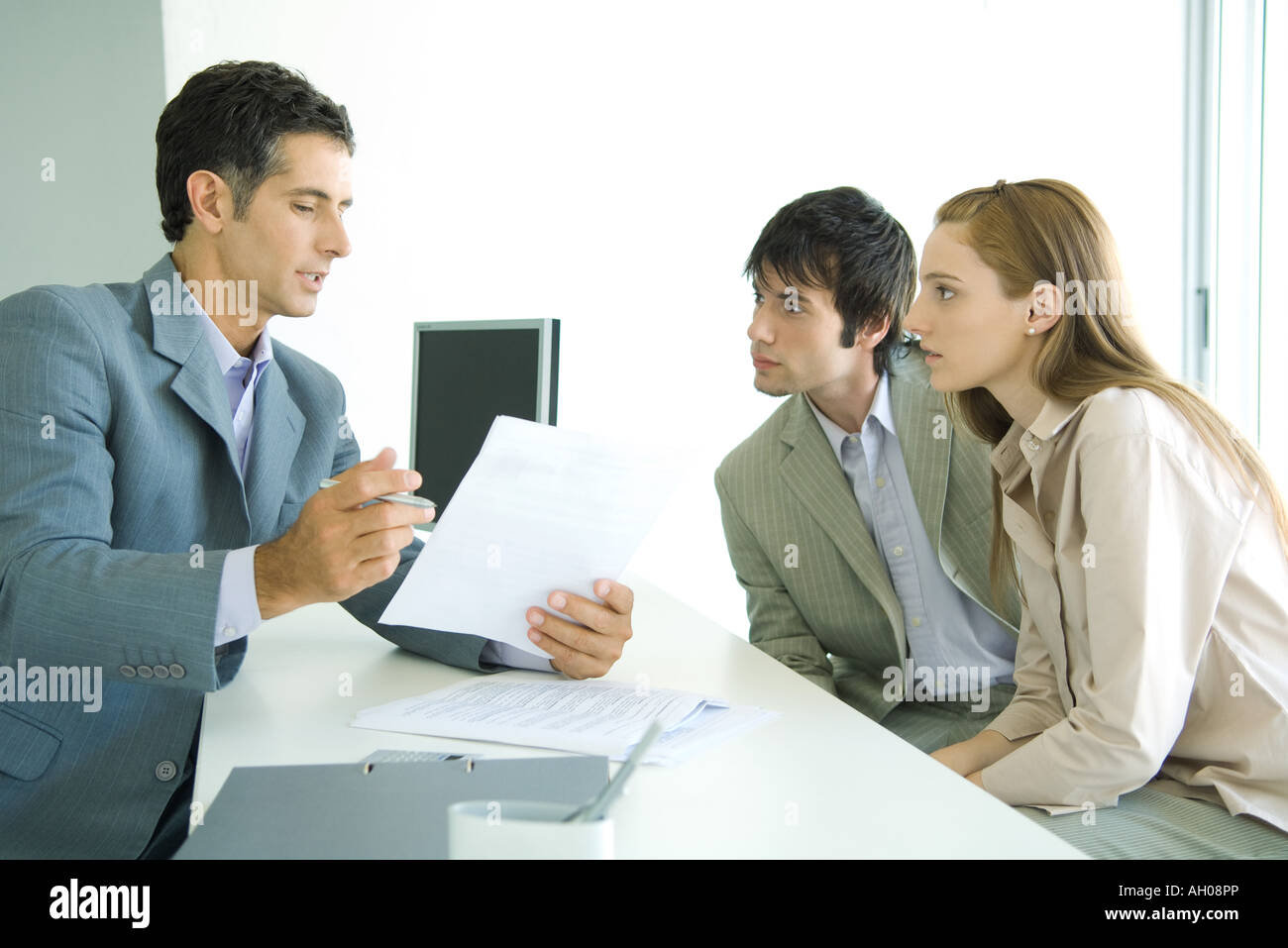 Couple sitting across from each other hi-res stock photography and ...