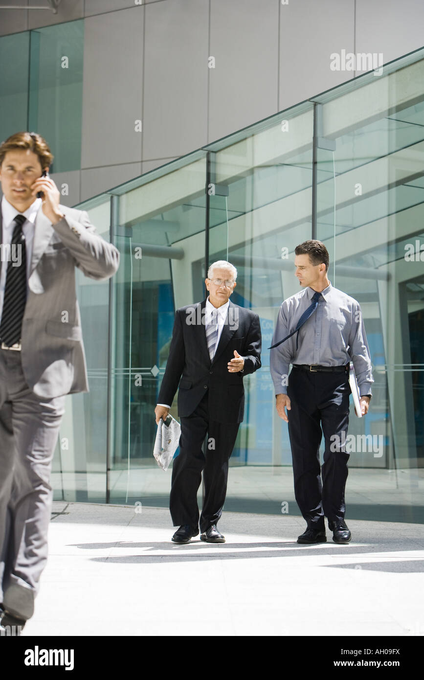 Businessmen walking away from camera hi-res stock photography and ...