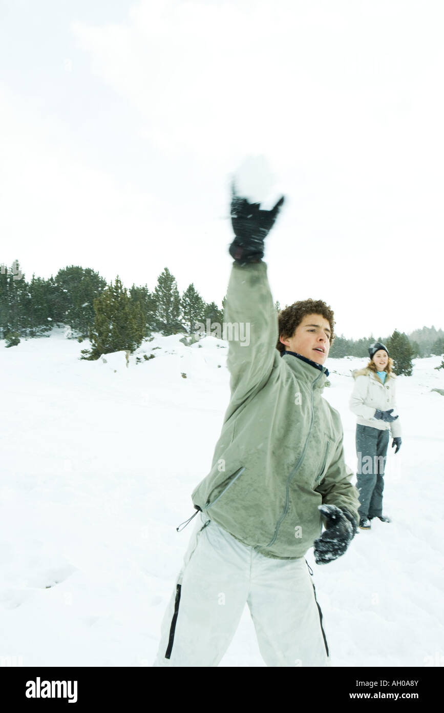 Boy throws snowball hi-res stock photography and images - Alamy