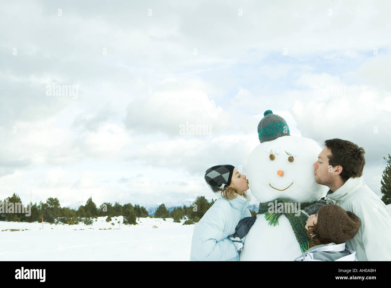 Children preteen snowman hi-res stock photography and images - Alamy