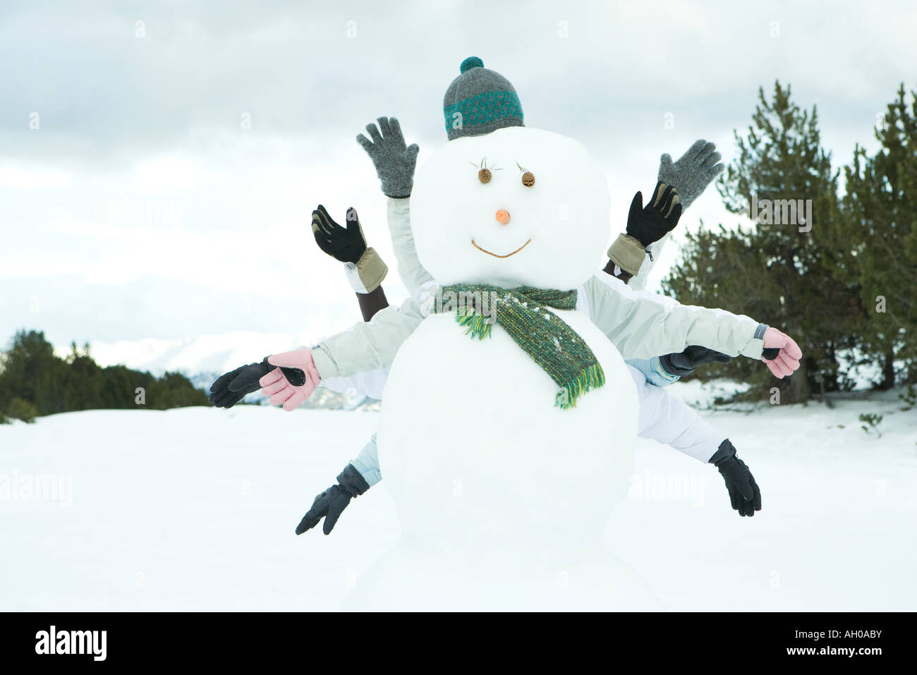 Snowman hiding hi-res stock photography and images - Alamy