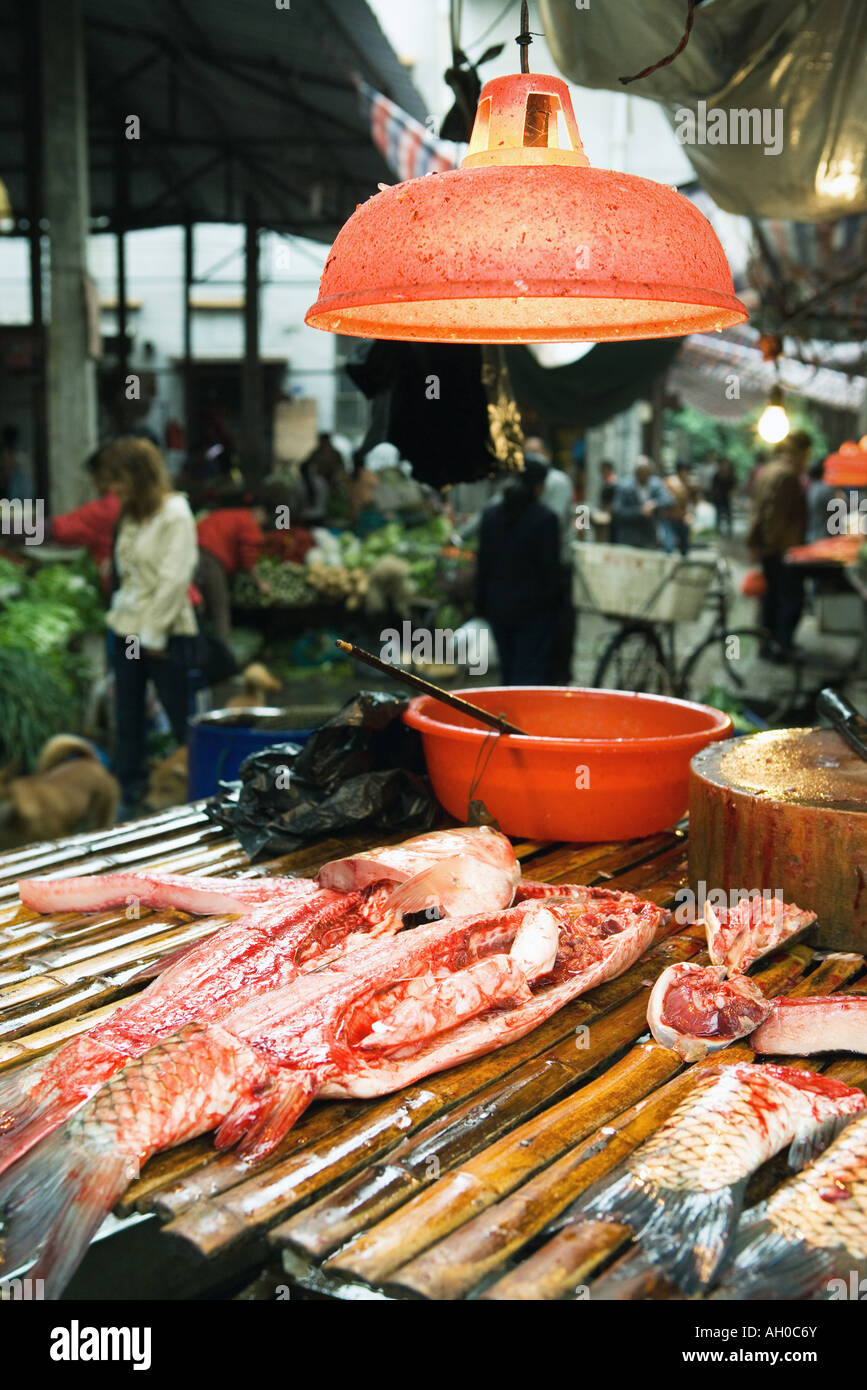 Cut up fish in market stall Stock Photo - Alamy