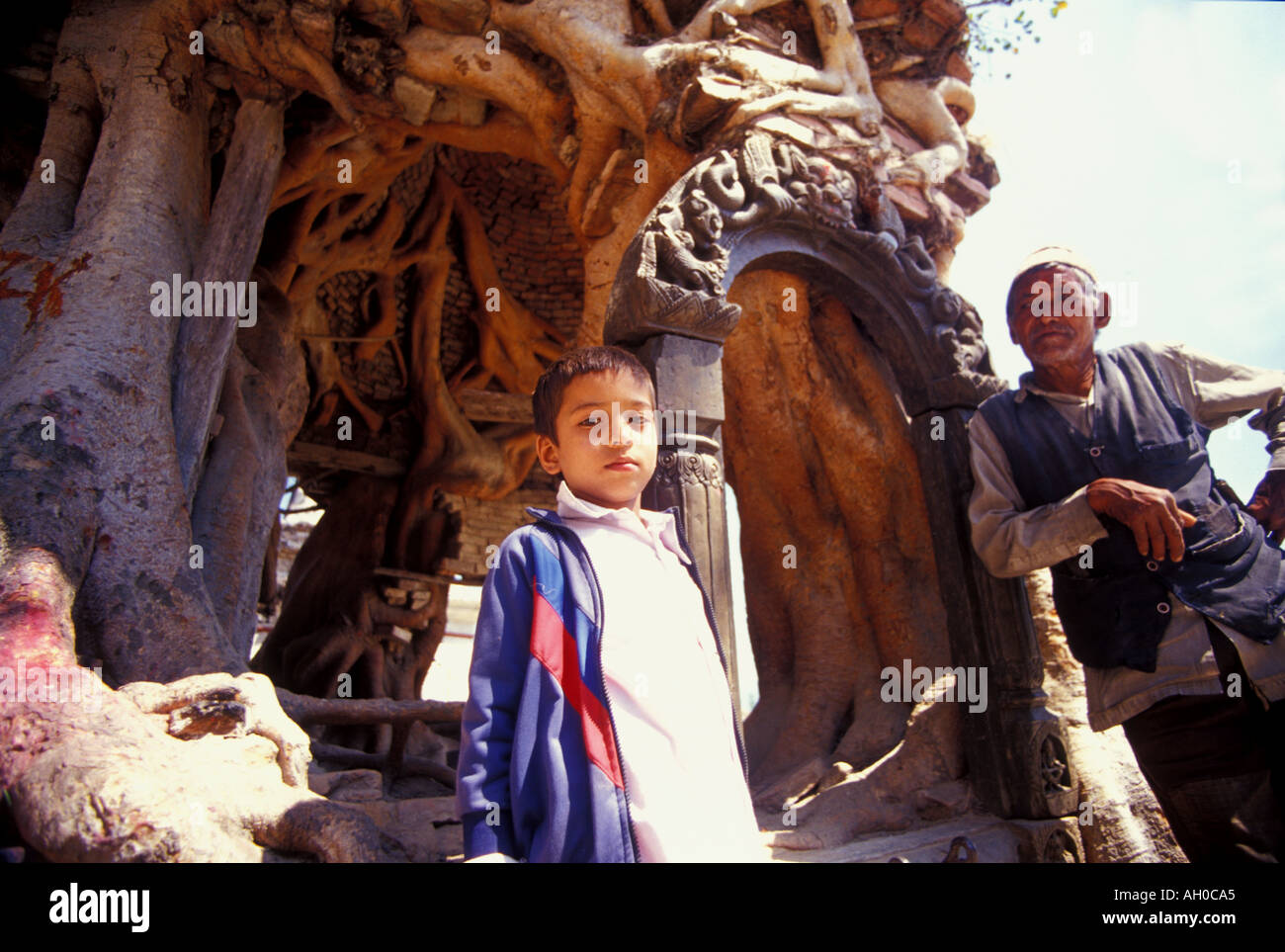 Nepal Kathmandu young Nepalese boy with his Grandfather next to an ...