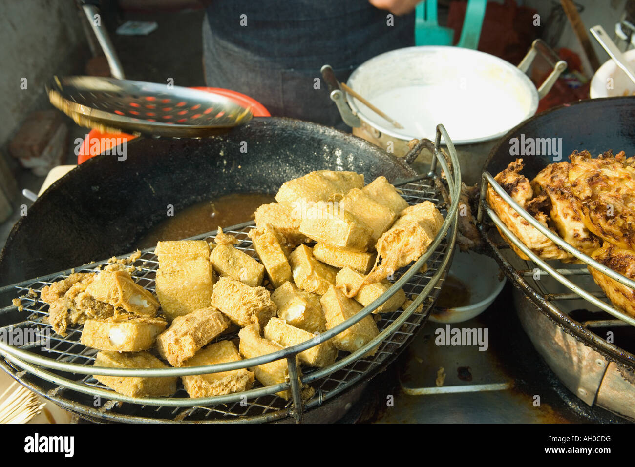 Tofu in wok in outdoor food stand, China Stock Photo - Alamy