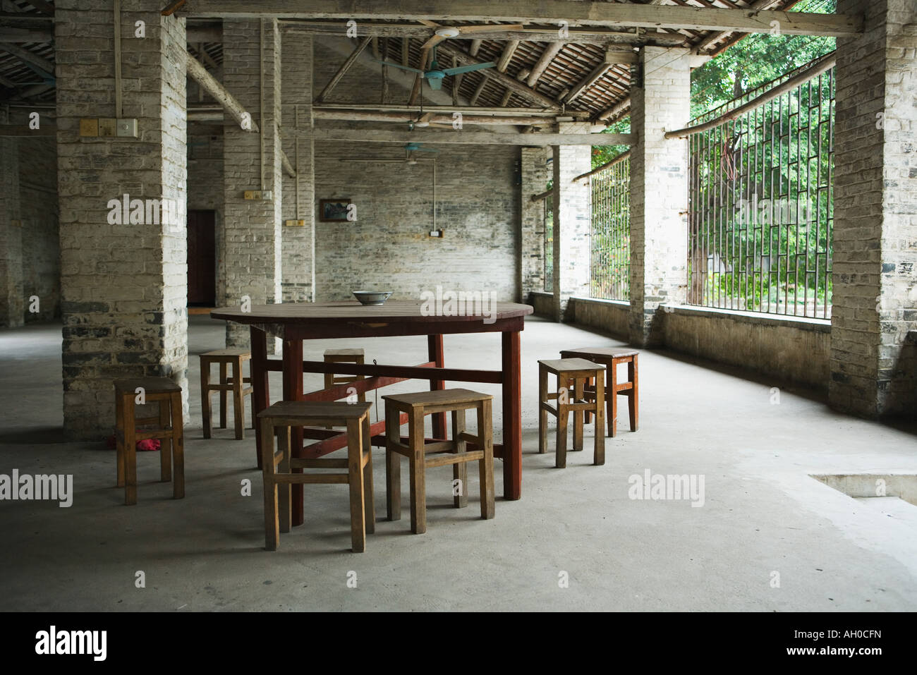 Wooden table and stools in temple's outdoor dining area Stock Photo - Alamy