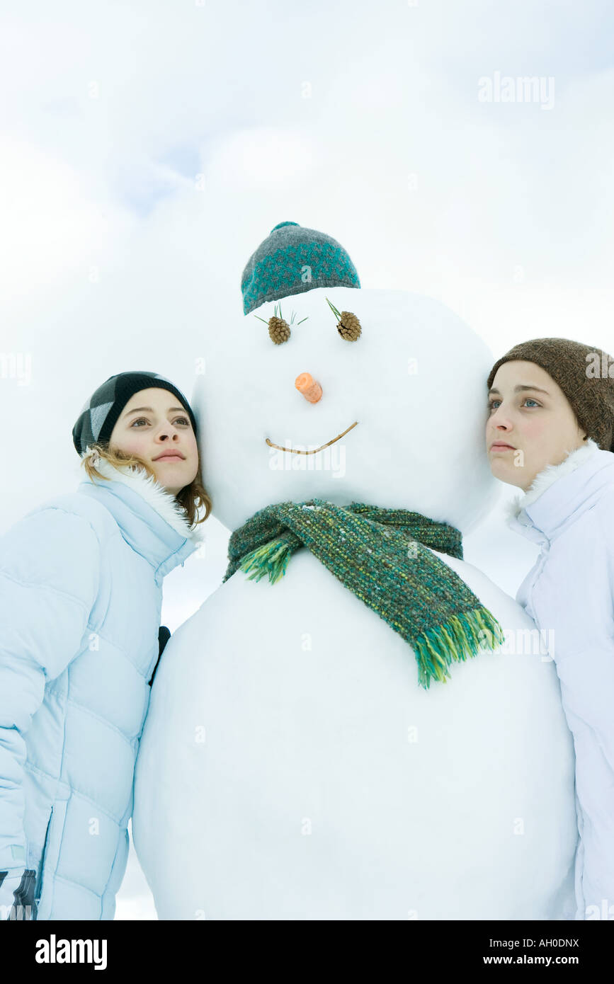 Snowman in snow eyes twigs hi-res stock photography and images - Alamy