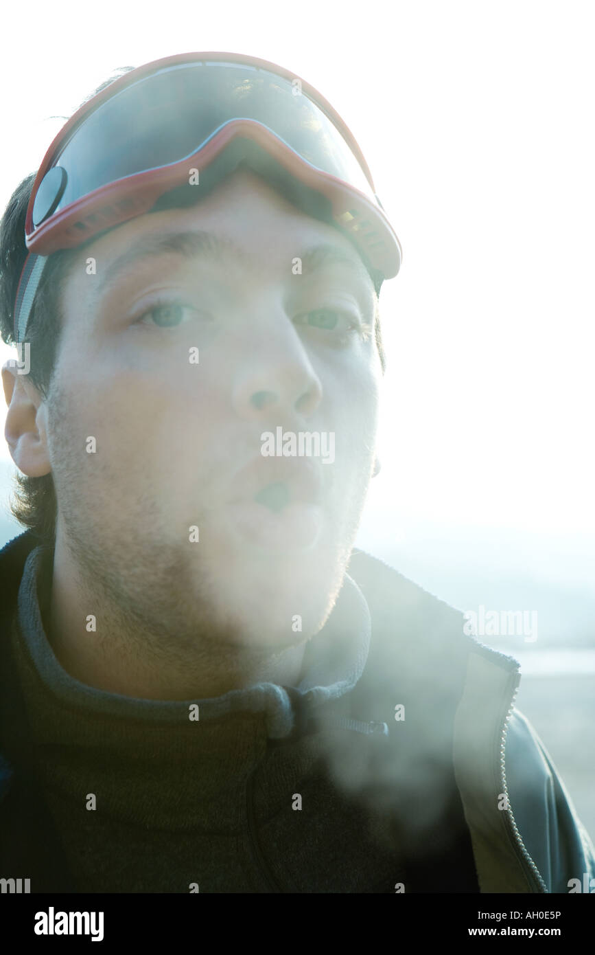 Breathing out into cold air hi-res stock photography and images - Alamy