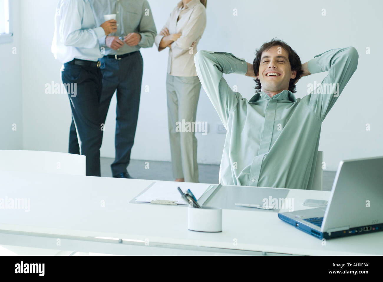Half seated leaning hi-res stock photography and images - Alamy