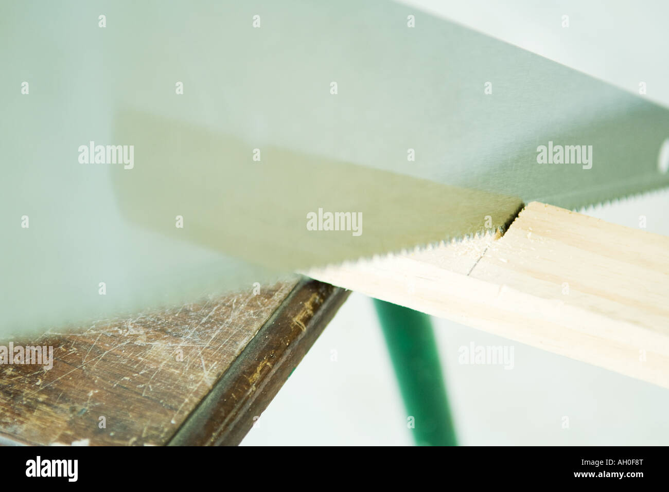 Saw cutting wood, close-up Stock Photo - Alamy