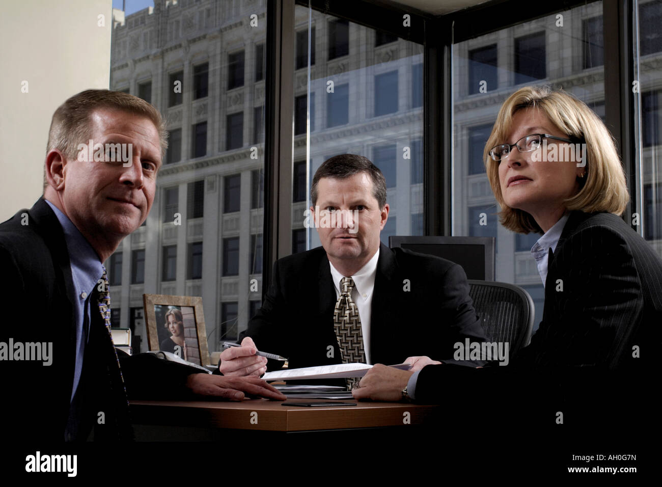 business men and woman with game faces on ready to work Stock Photo - Alamy