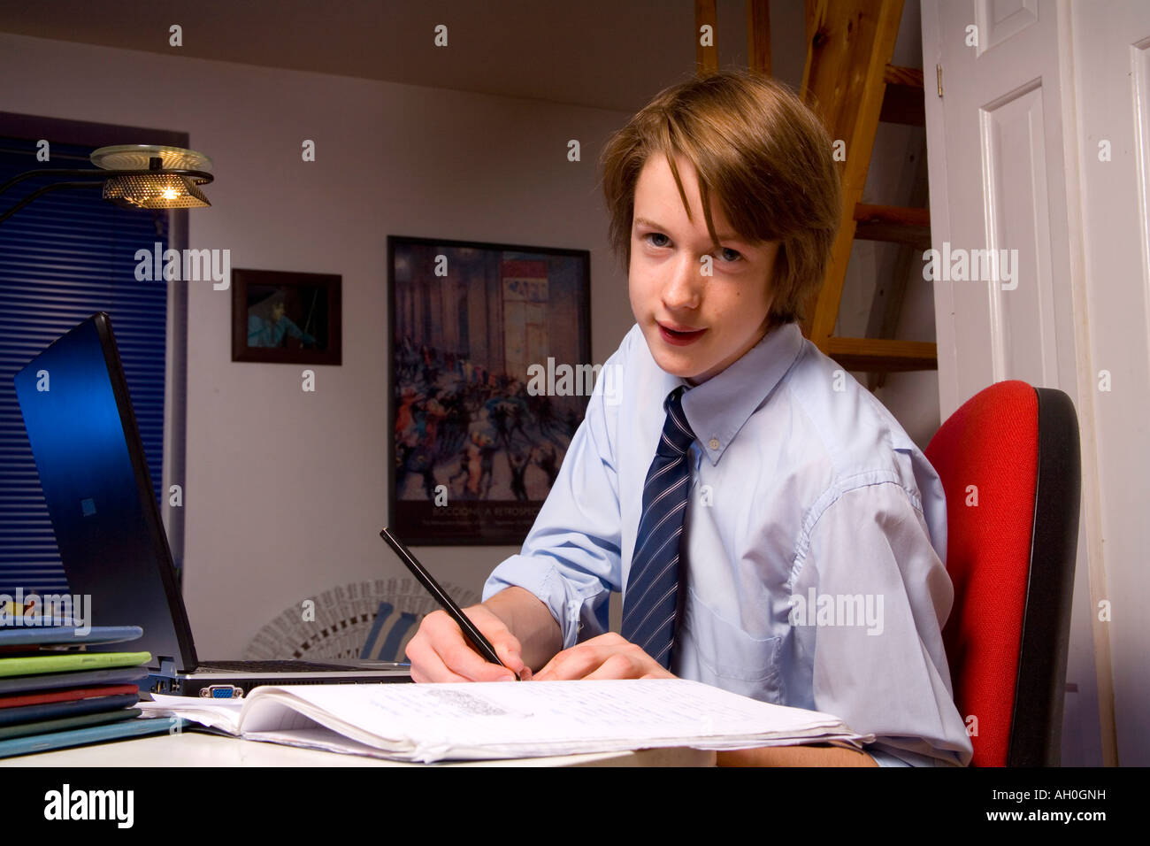 Teenage boy studying and using Laptop Computer Stock Photo - Alamy