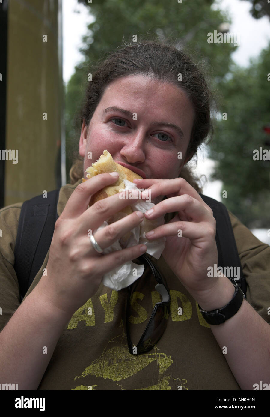 Tourist eating french crepes Stock Photo - Alamy