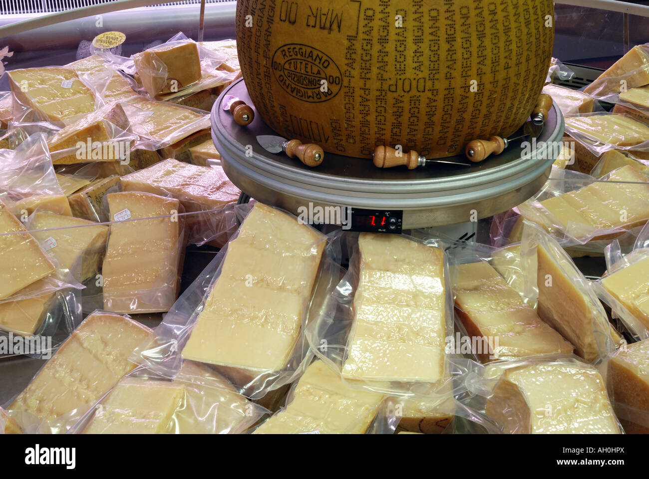 A round of parmesan cheese in an Italian deli Stock Photo - Alamy
