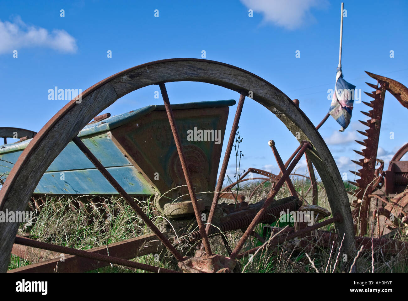 Old disused agricultural equipment in a field Stock Photo - Alamy