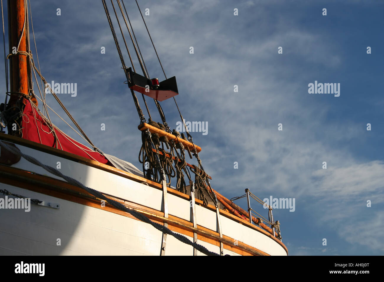 Crop of a small ship at the harbour Stock Photo - Alamy
