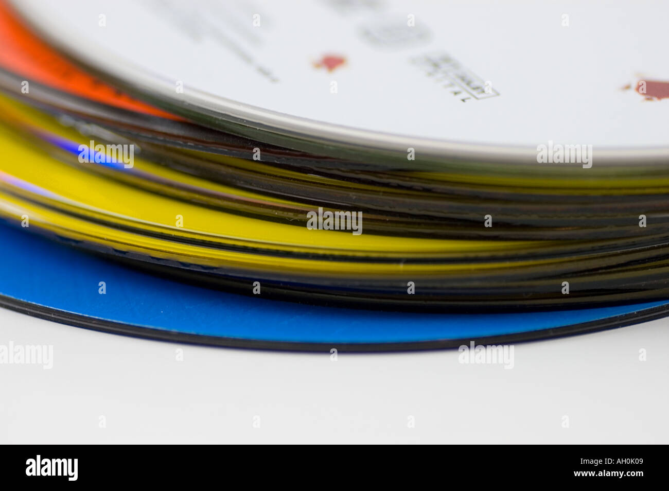 DVD stack against a white background Stock Photo - Alamy