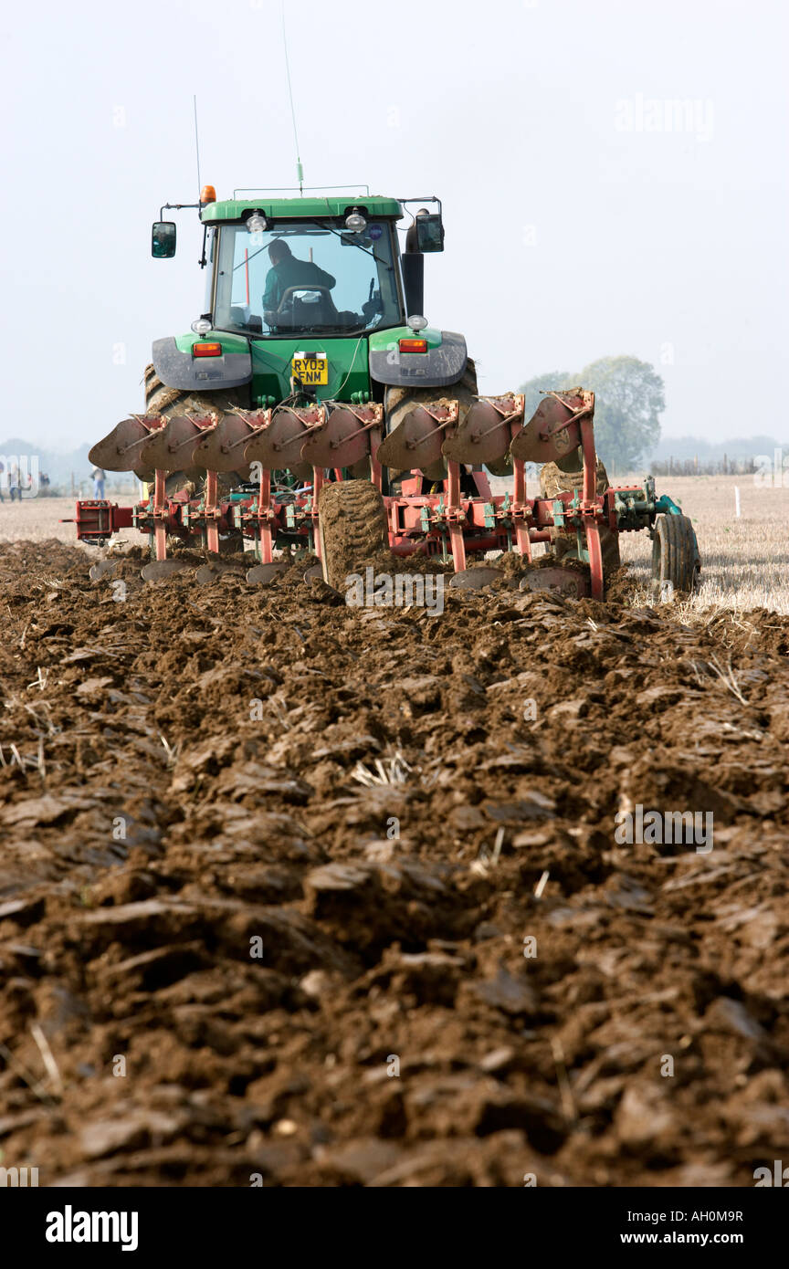 Tractor and plough at Ploughing match Stock Photo - Alamy