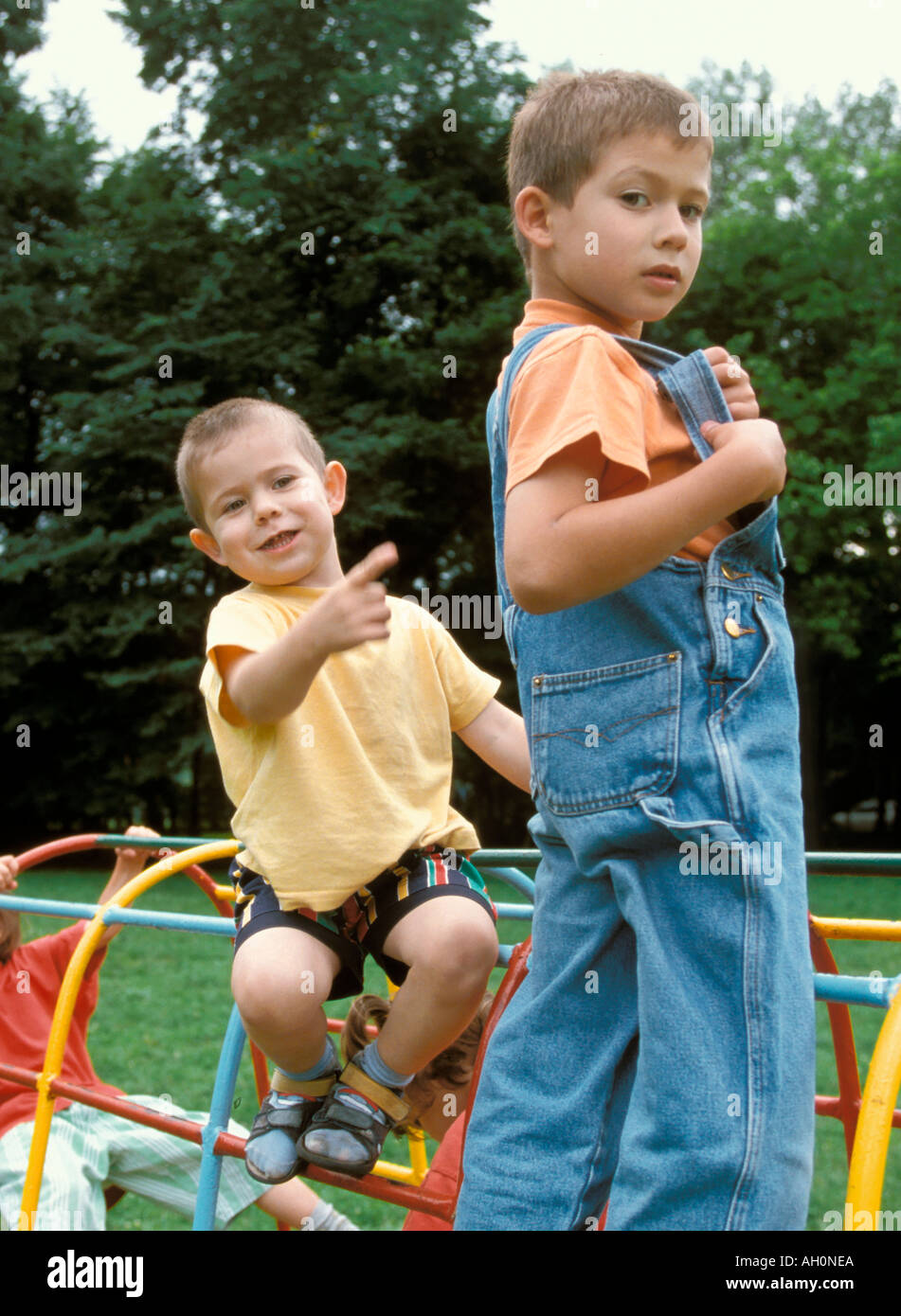 Boys on playground Stock Photo - Alamy