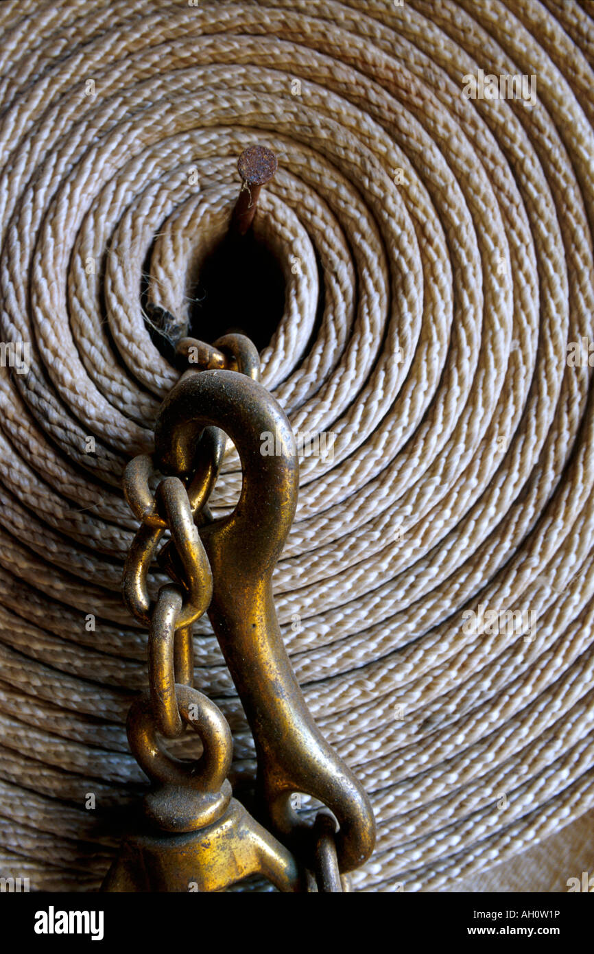 A rope hanging in a barn Stock Photo - Alamy