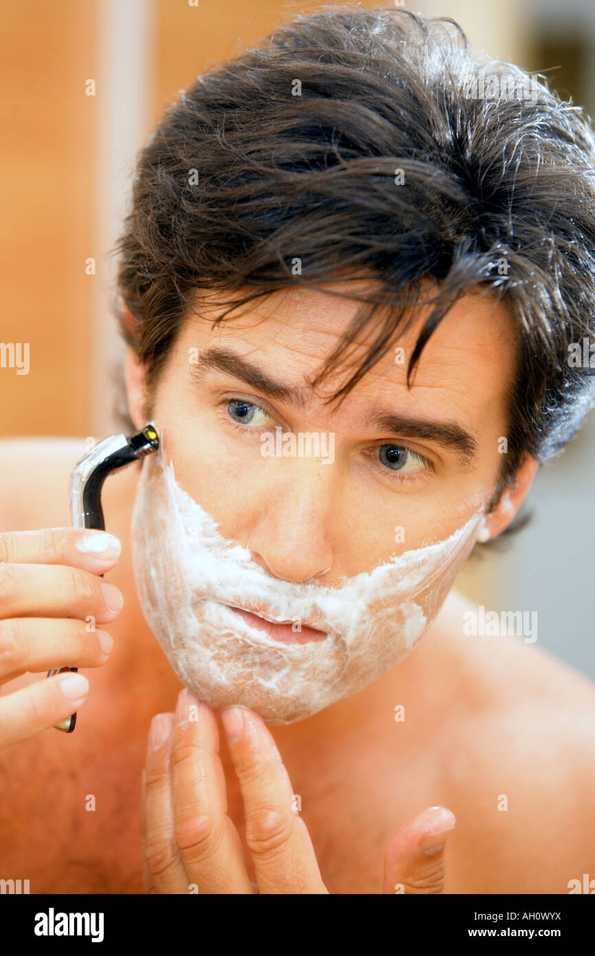 Man shaving, portrait Stock Photo - Alamy