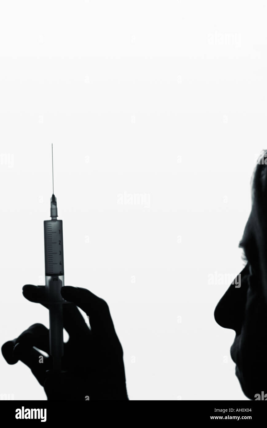 Needle phobia doctor syringe hi-res stock photography and images - Alamy