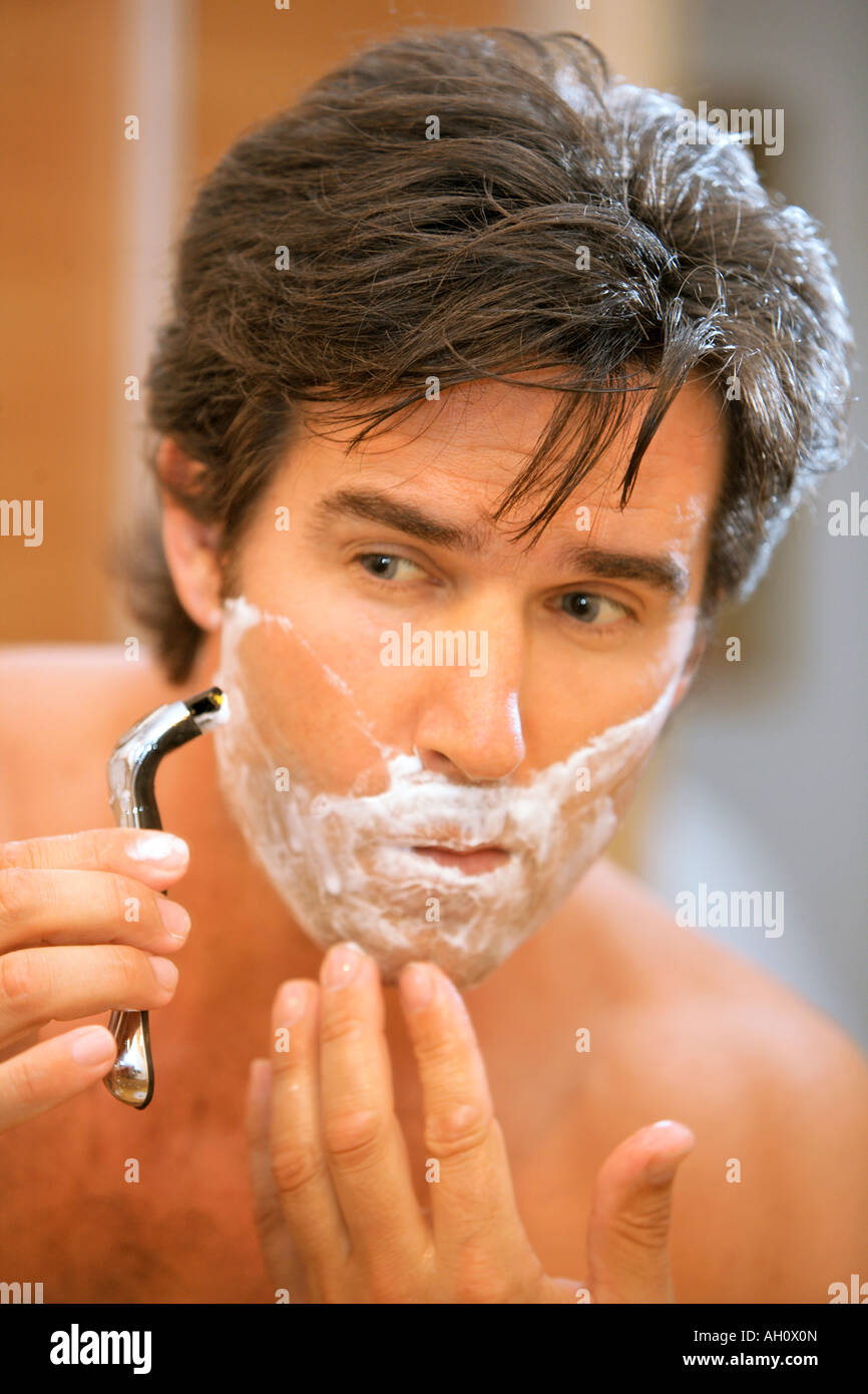 Man shaving, portrait Stock Photo - Alamy