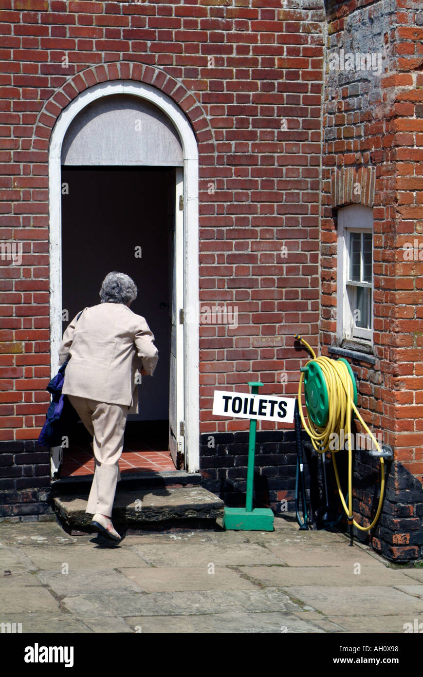 women entering public toilet Stock Photo - Alamy