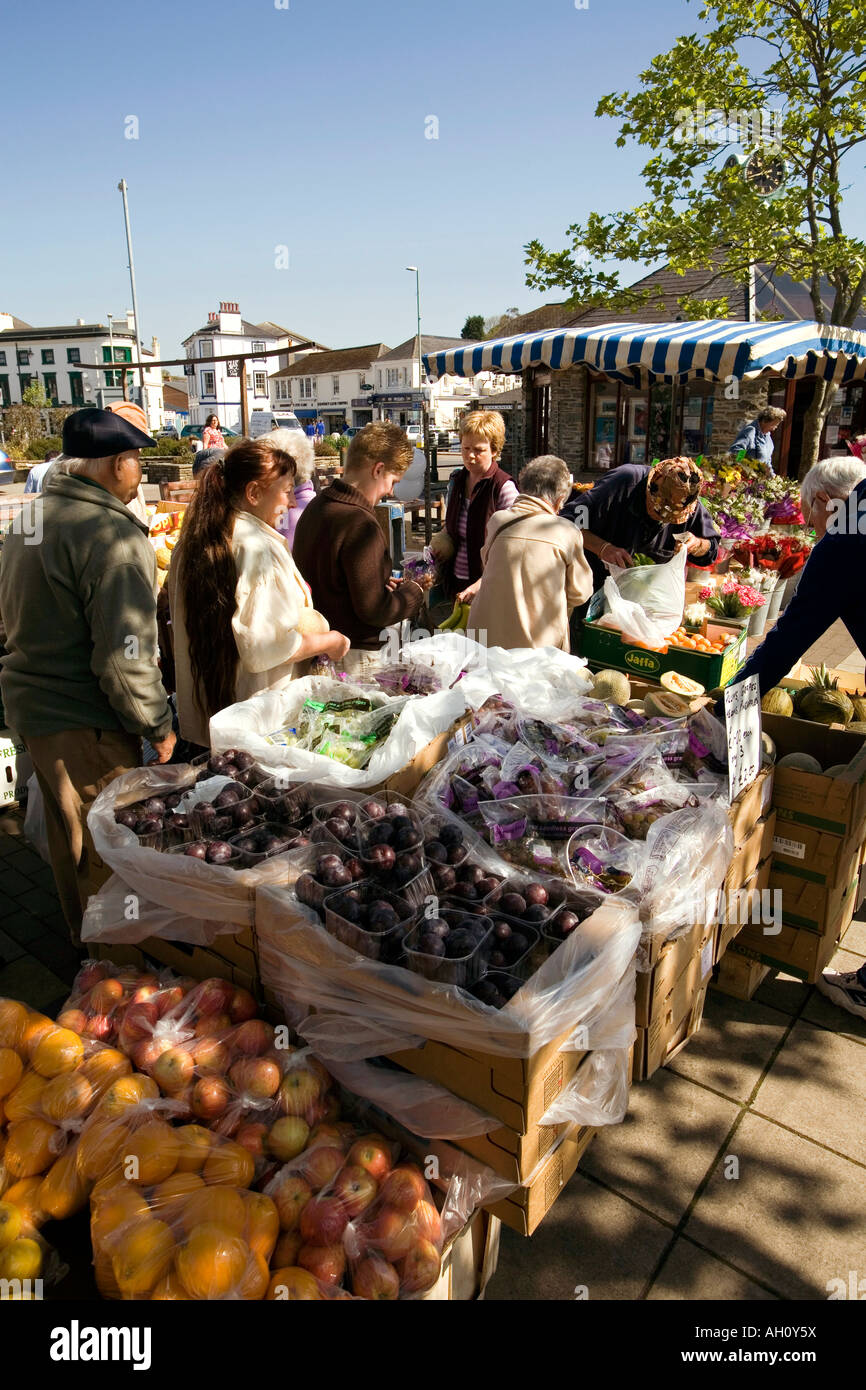 UK Devon Kingsbridge market people at fruit and vegetable stall Stock ...