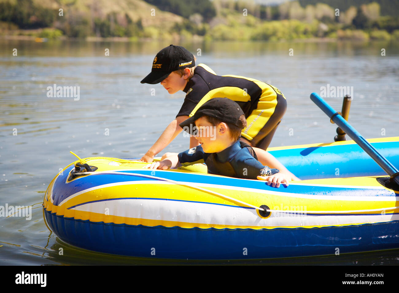 Children playing in inflatable boat hi-res stock photography and images ...