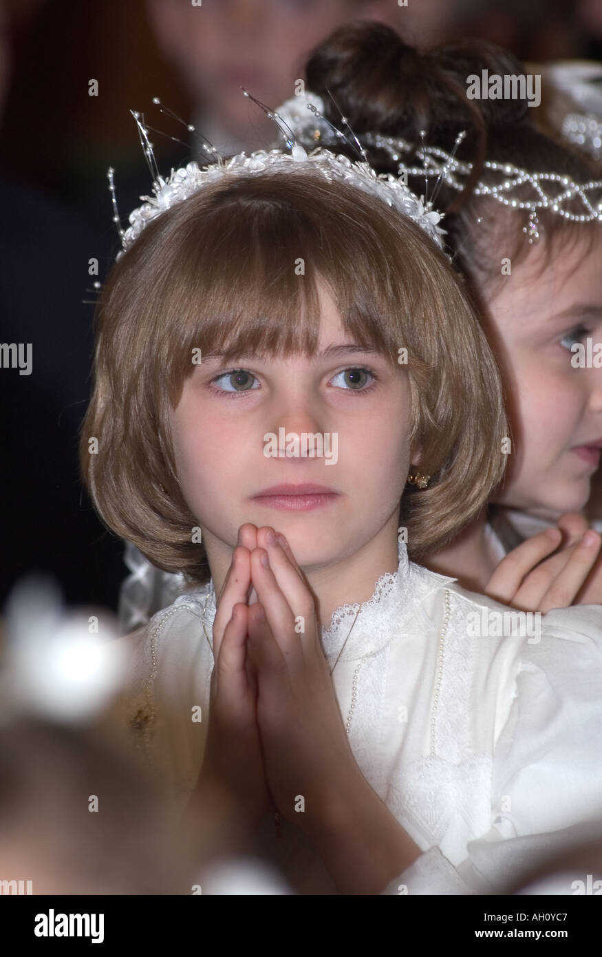 Young girl at her First Communion ceremony at church Stock Photo - Alamy