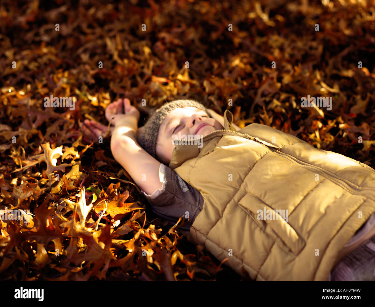Child laying on ground hi-res stock photography and images - Alamy