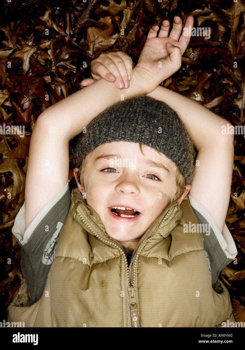 Child laying on ground hi-res stock photography and images - Alamy