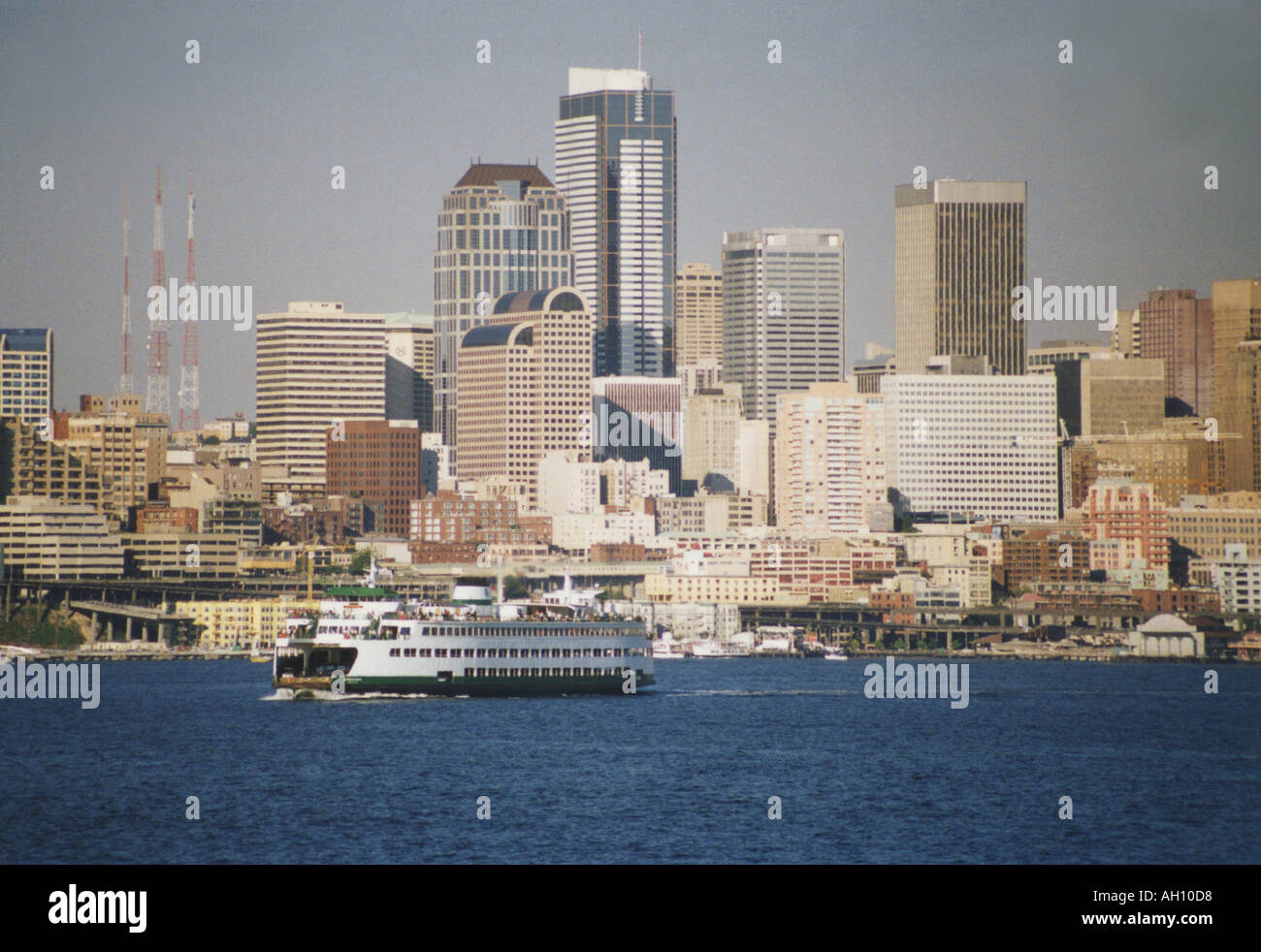 Washington State Ferry boat and Seattle skyline and waterfront on a ...