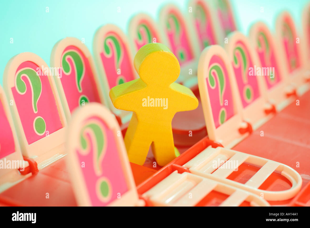 Wooden Figure on Quiz Game Stock Photo - Alamy