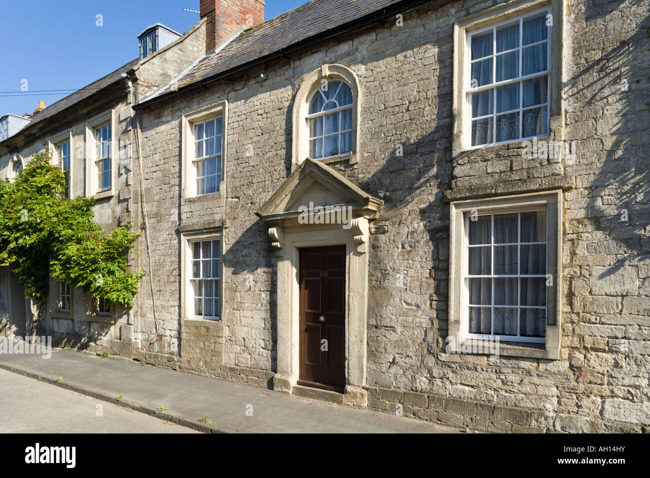 A Georgian fronted house in the High Street in the Cotswold village of ...