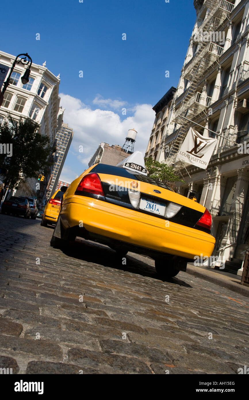 YELLOW TAXI CAB (©FORD MOTOR COMPANY 2001) GREENE STREET SOHO MANHATTAN ...
