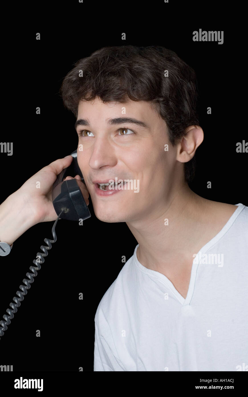 Human hand holding telephone cord hi-res stock photography and images ...