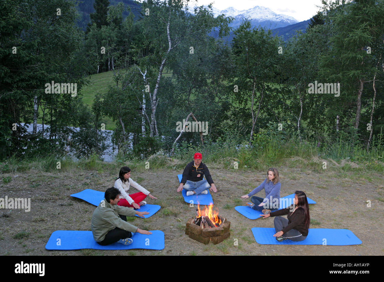 people doing vedische fire meditation Stock Photo - Alamy