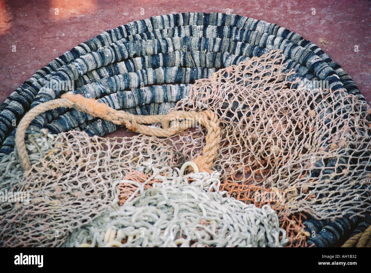 Fishing nets and floats in boat Stock Photo - Alamy