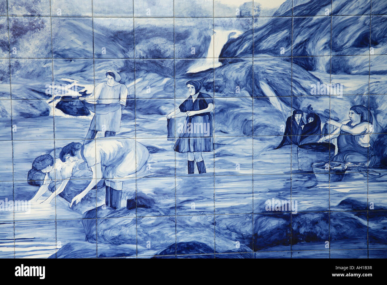 Panel of portuguese glazed tiles showing a group of azorean women ...