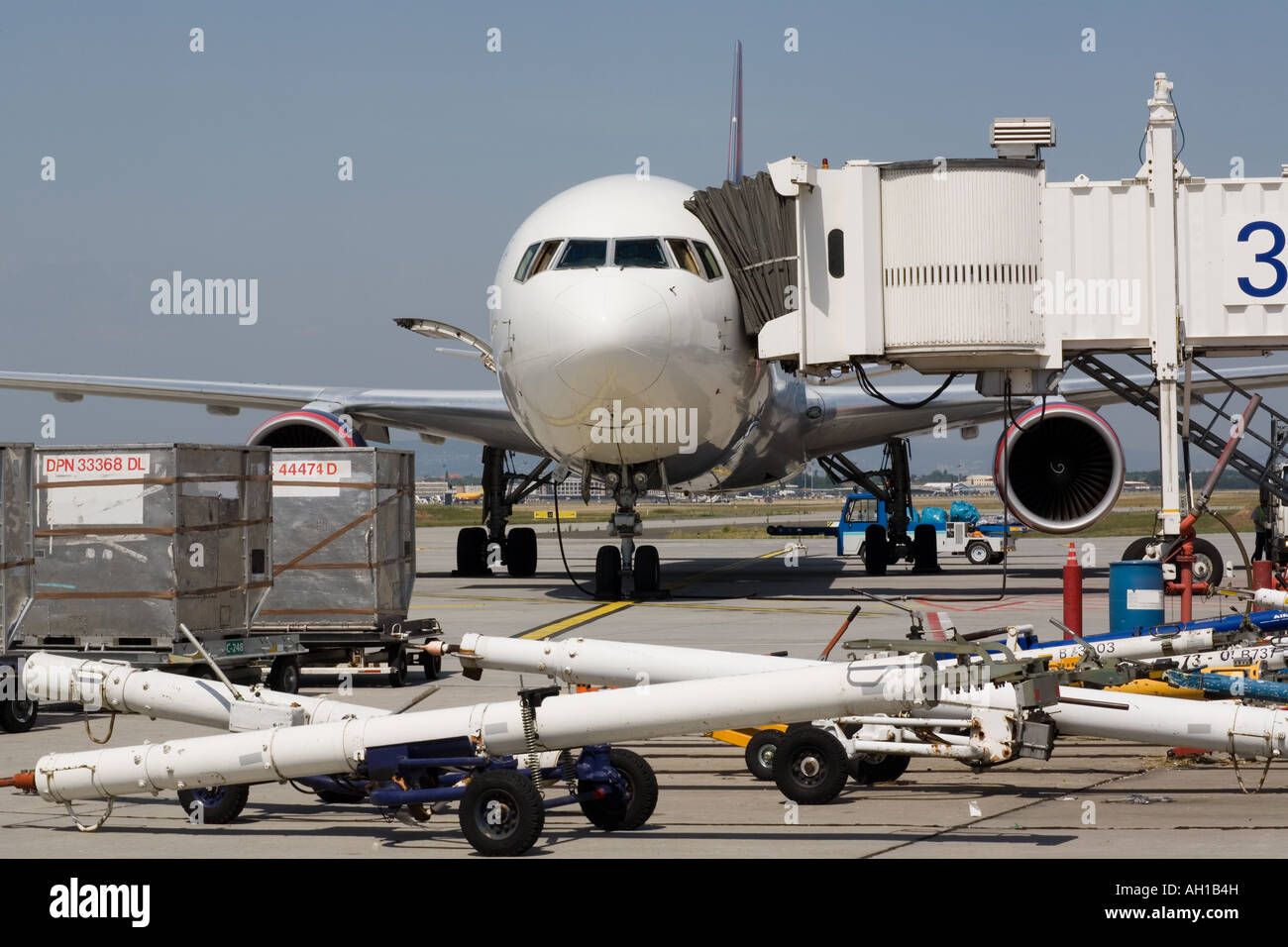 aircraft on the ground getting loaded Stock Photo - Alamy