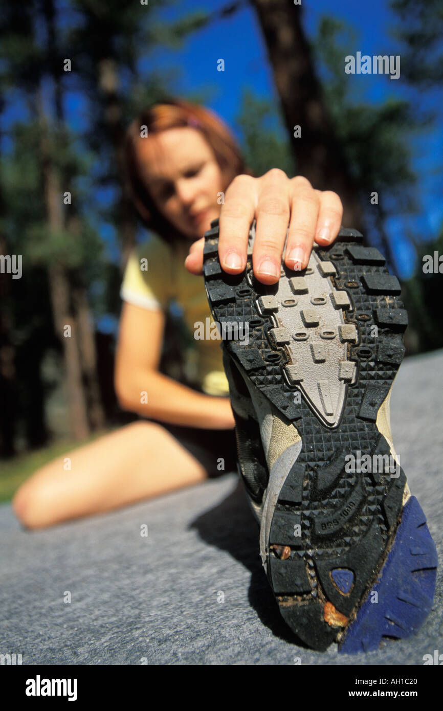 Female stretching before running Stock Photo - Alamy