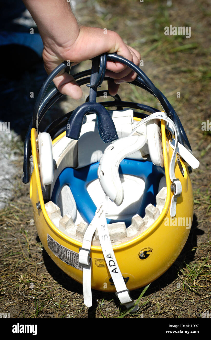 Hand on helmet hi-res stock photography and images - Alamy