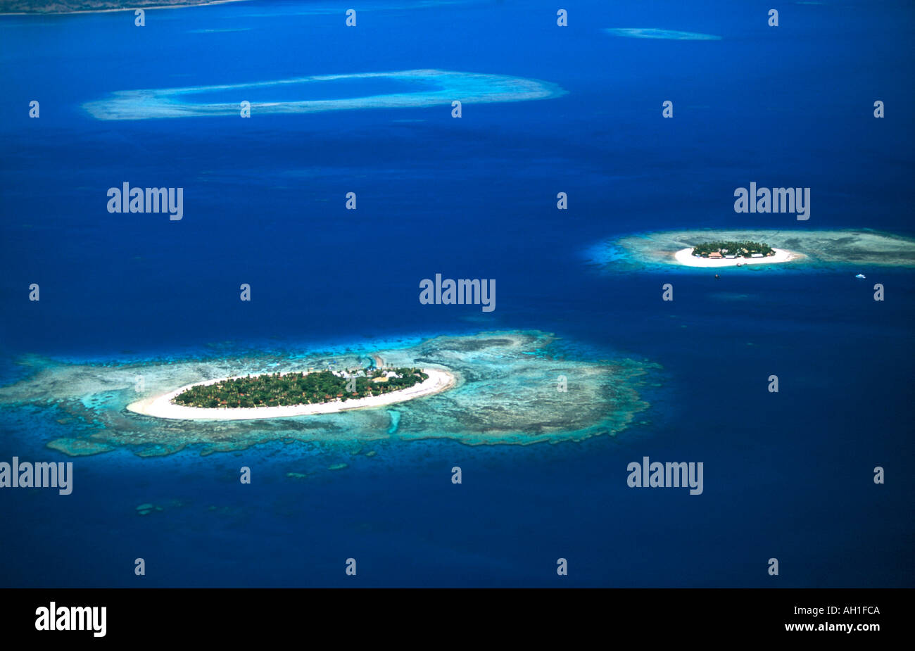 Mamanuca Island Group Treasure Island left and Beachcomber Island right ...