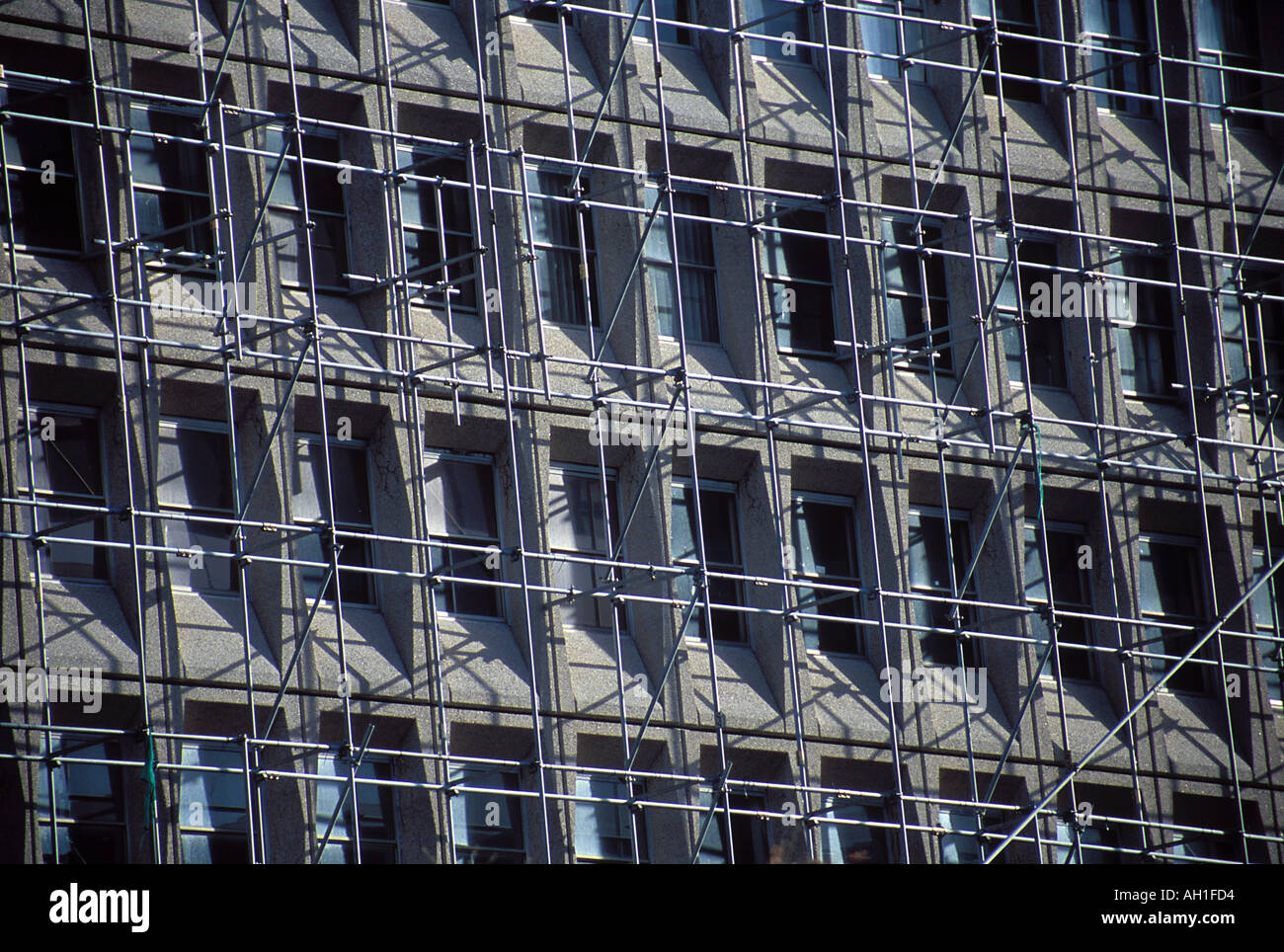 Scaffolded facade to a modern office block in Liverpool Stock Photo - Alamy