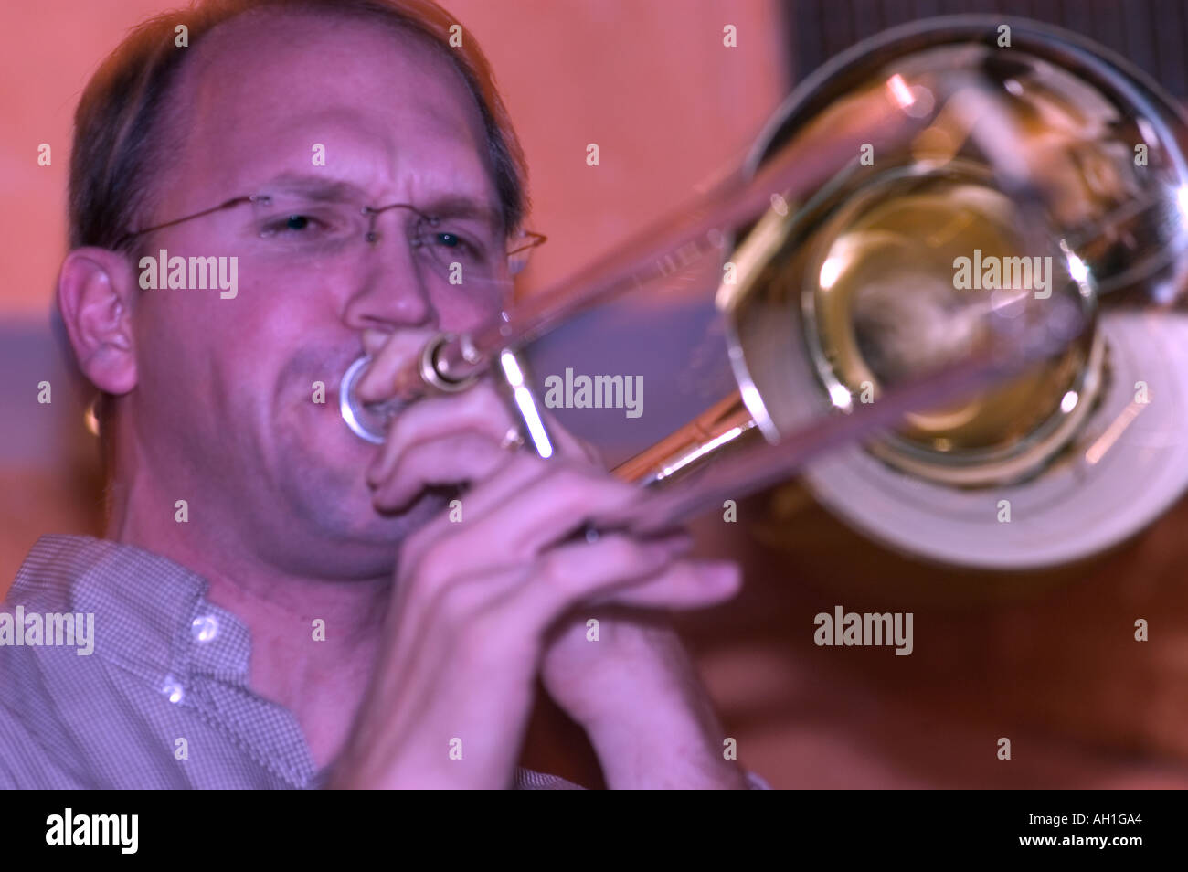 Musician holding trombone hi-res stock photography and images - Alamy