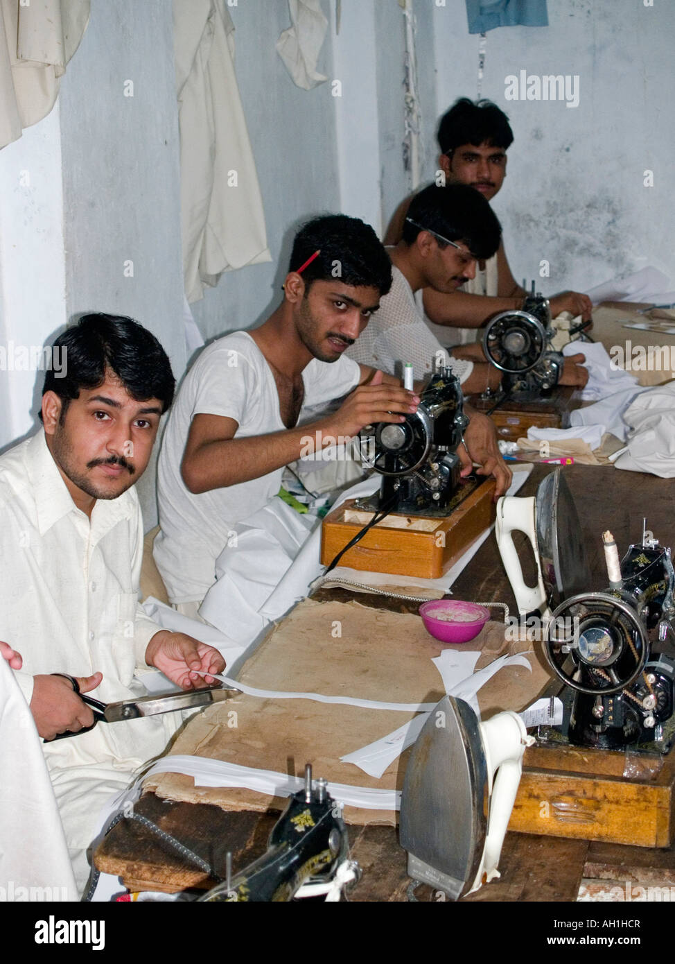 garment workers in a factory Peshawar Pakistan Stock Photo - Alamy