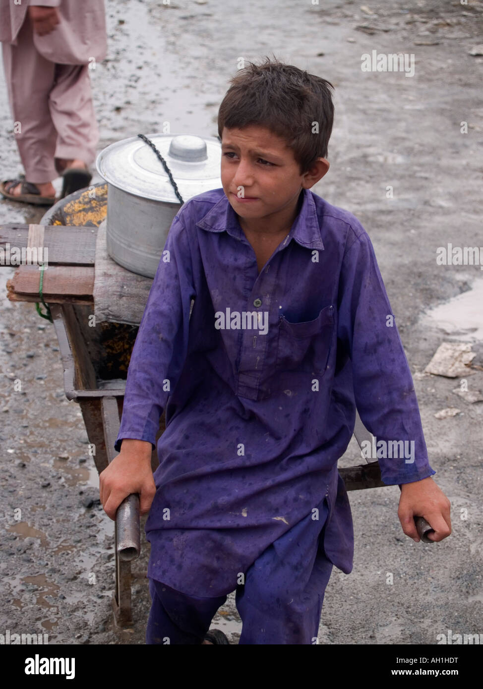 an Afghan refugee hawking corn Peshawar Pakistan Stock Photo - Alamy