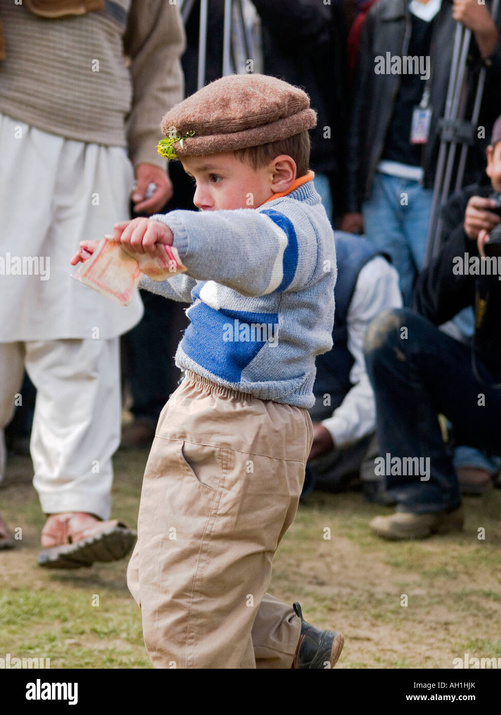 young boy doing traditional dance at the Shandur Pass Festival Pakistan ...